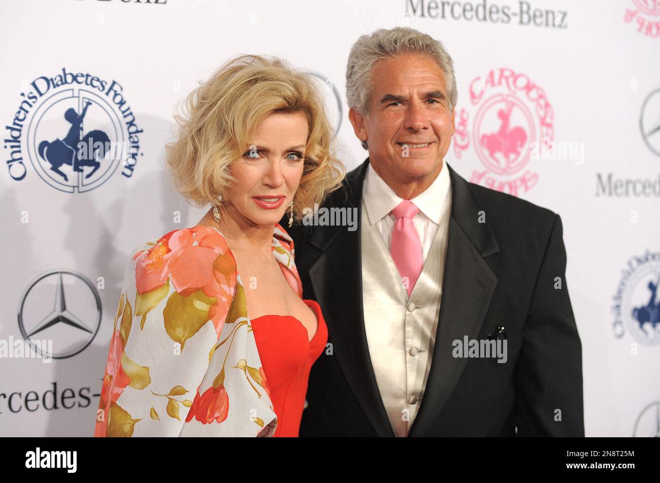 Donna Mills and Richard Holland arrive at The Carousel of Hope at The ...