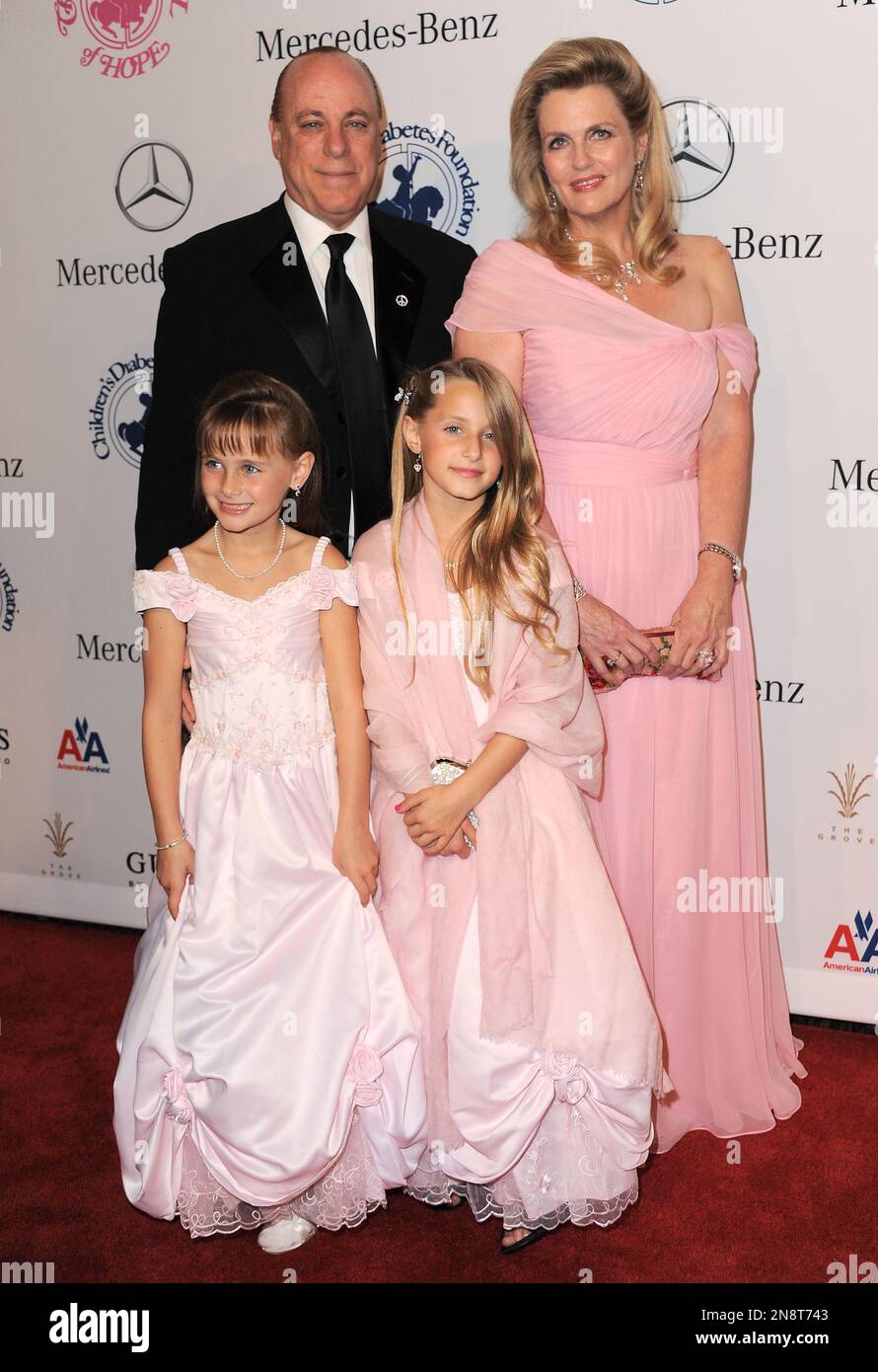 Nancy Davis (top R) with husband Ken Rickel and daughters Isabella ...