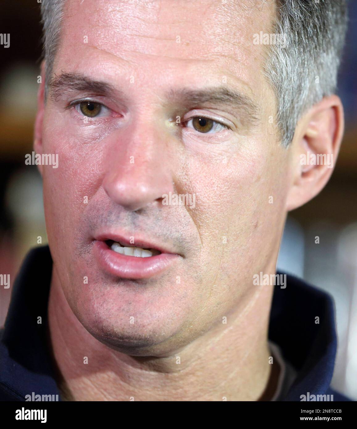 Sen. Scott Brown, R-Mass., speaks with reporters during a campaign stop ...