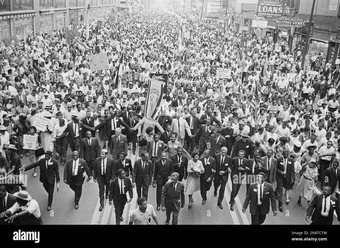Rev. Martin Luther King Jr., center foreground, walks in vanguard of ...