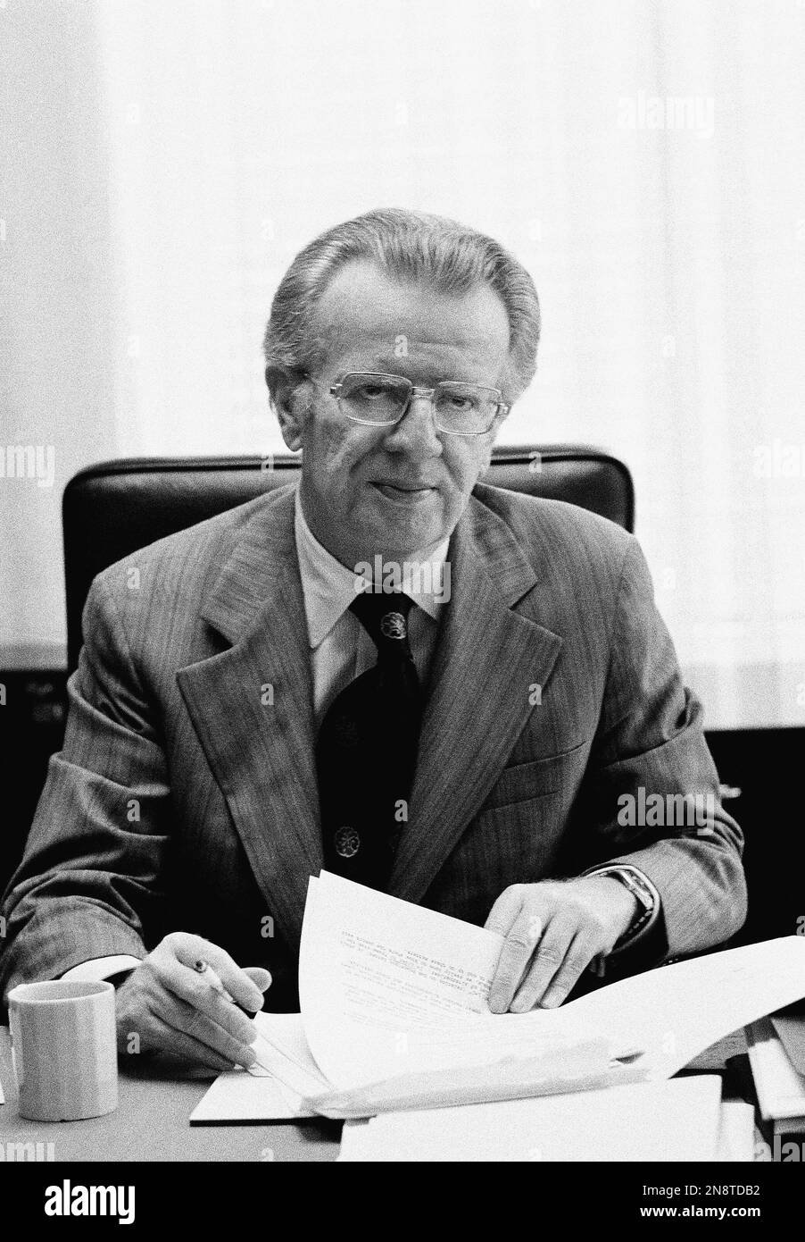 National Basketball Commissioner Lawrence O' Brien poses in his office ...