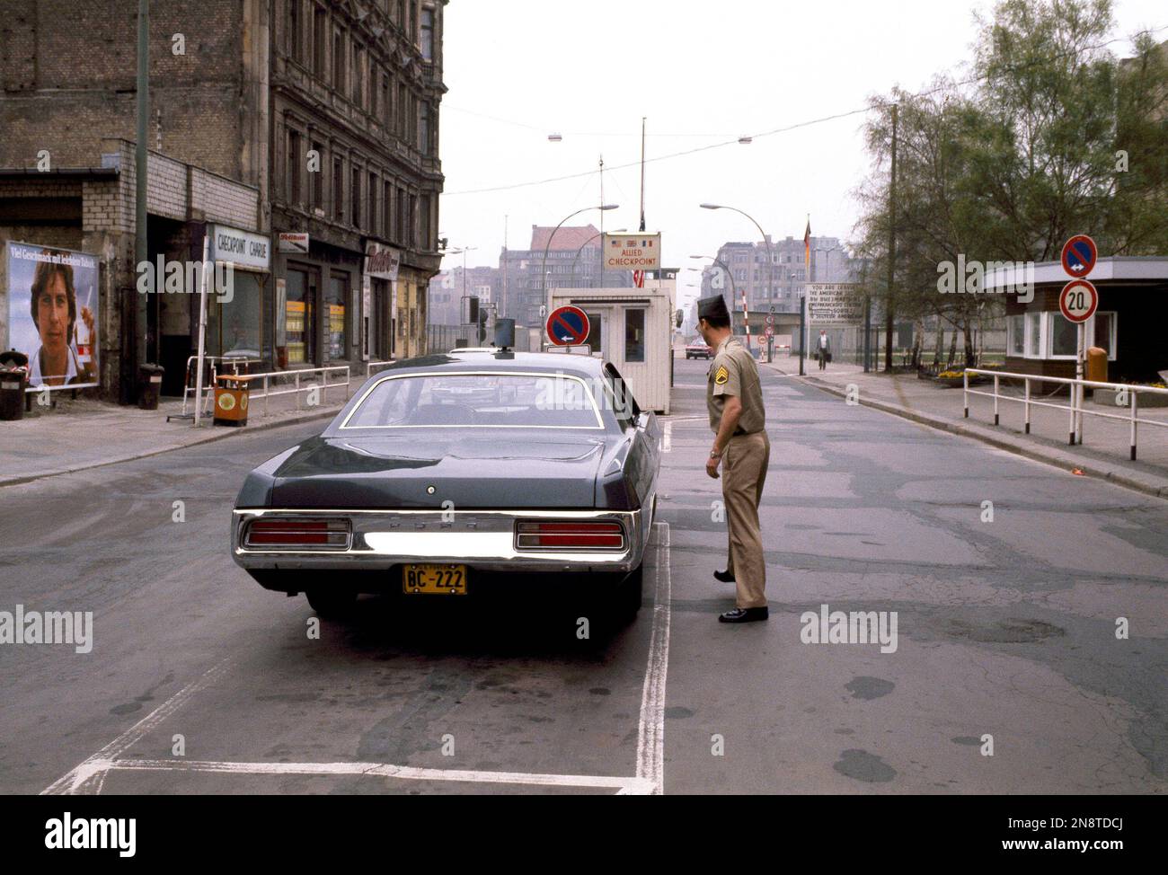 Allied checkpoint showing cars and people leaving the American sector ...
