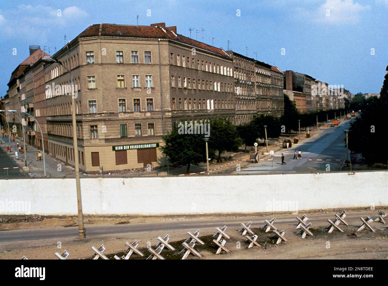 A section of the Berlin Wall and apartment buildings beyond, July 1981 ...