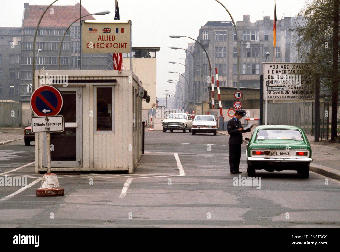Allied checkpoint showing cars and people leaving the American sector ...
