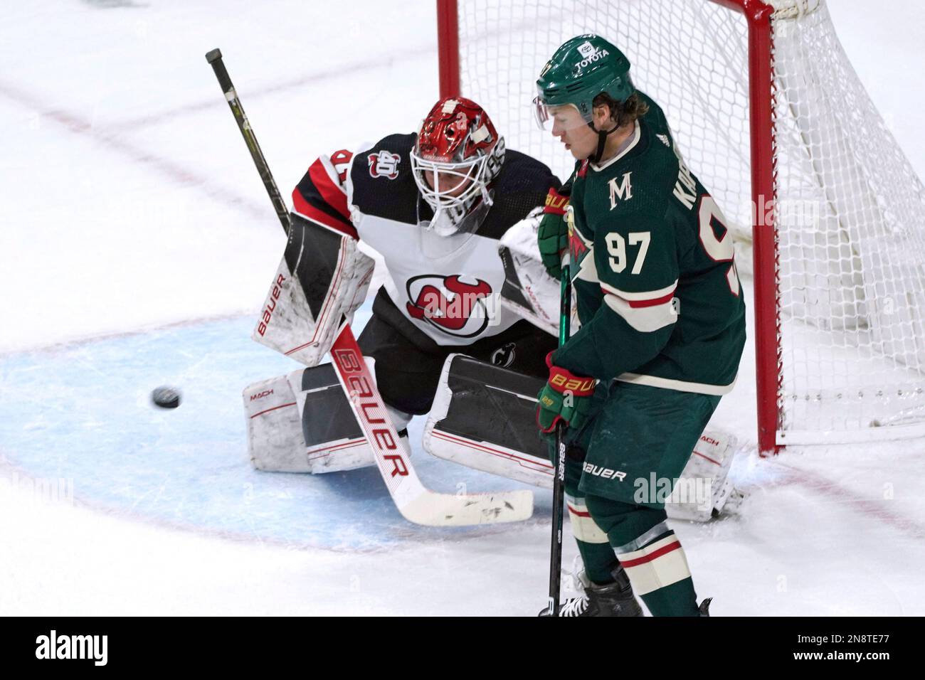 Minnesota Wild's Kirill Kaprizov (97) watches a shot sail by New Jersey ...