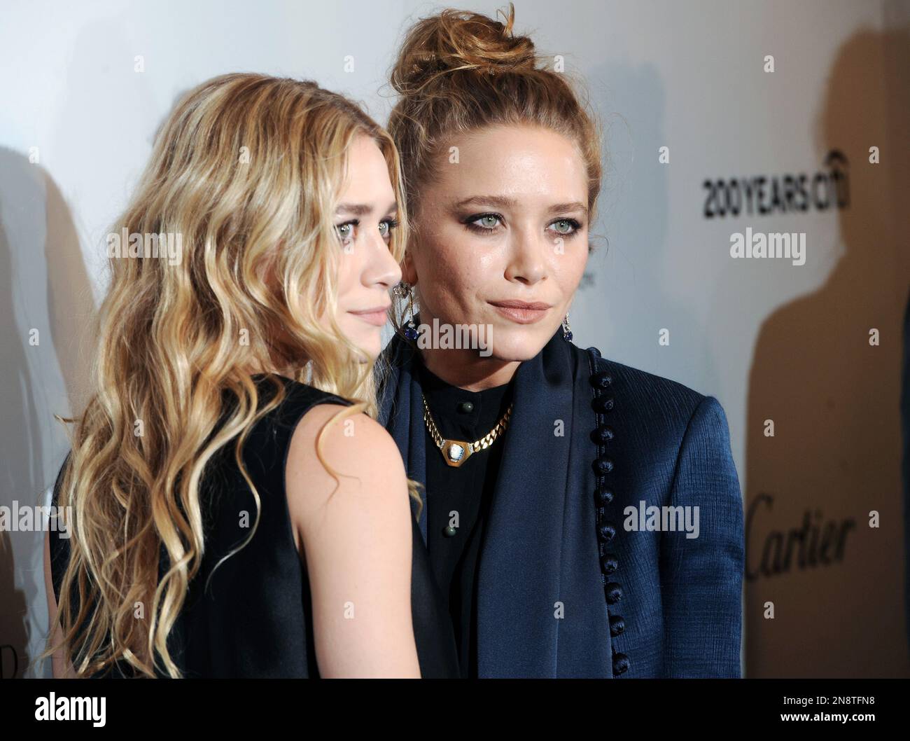 Honorees Ashley, left, and Mary Kate Olsen attend WSJ. Magazine's ...