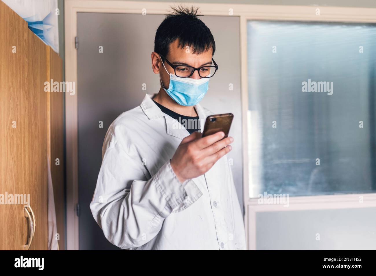 Male Scientist Using Smartphone Portrait Stock Photo - Alamy