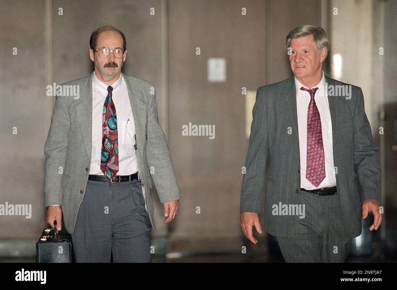 Homicide investigators from the Los Angeles Police Department Tom Lang ...