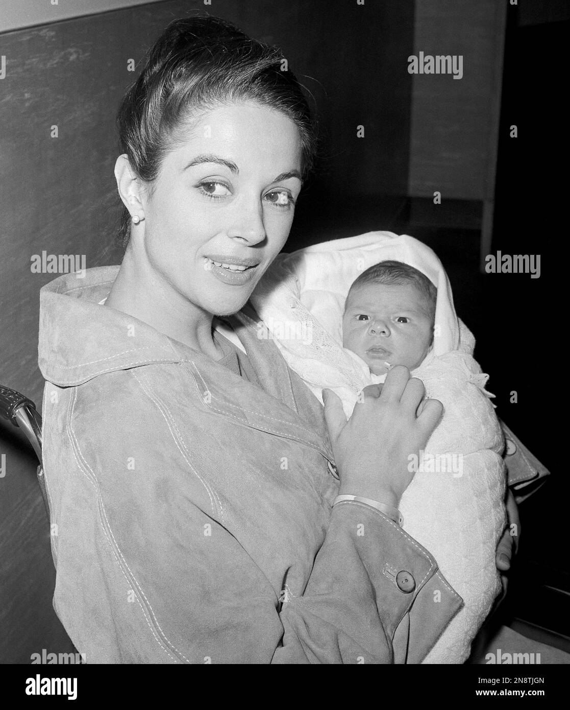 Actress Dana Wynter shows off her baby son as she leaves Cedars of ...