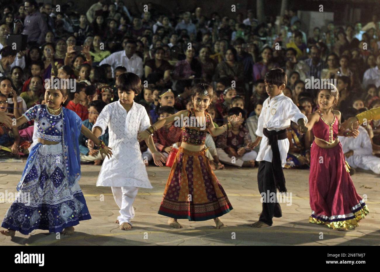 In this Wednesday, Oct. 17, 2012 photo, Indian children perform the ...