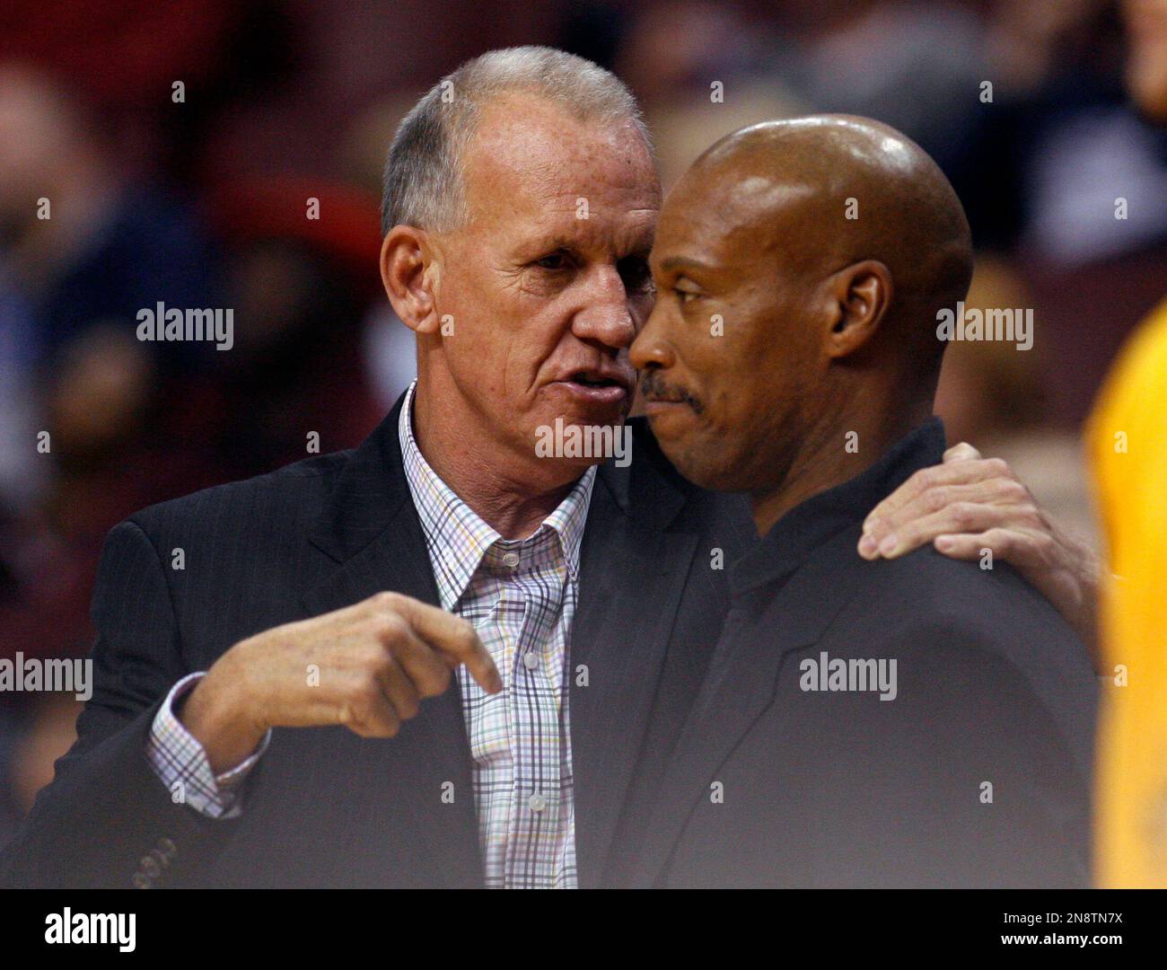Philadelphia 76ers coach Doug Collins, left and Cleveland Cavaliers ...