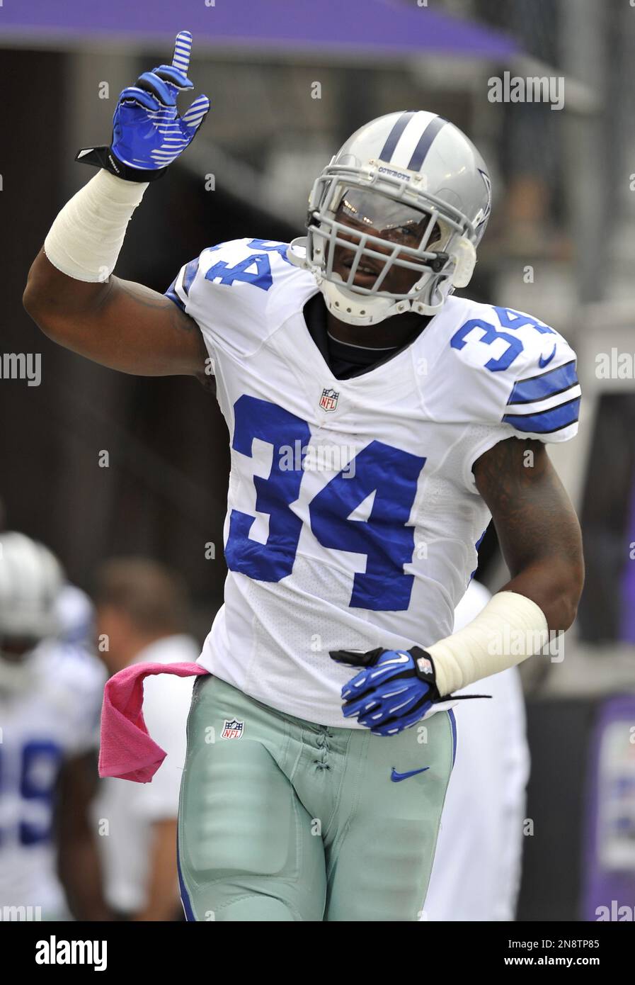 Dallas Cowboys running back Phillip Tanner runs onto the field before ...