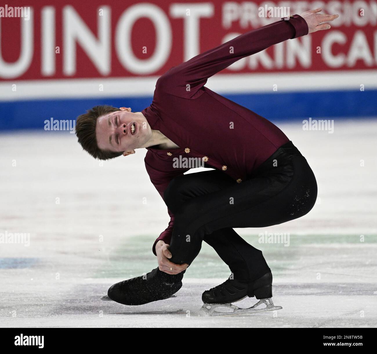 Liam Kapeikis, of the United States, competes in the men's free skating ...