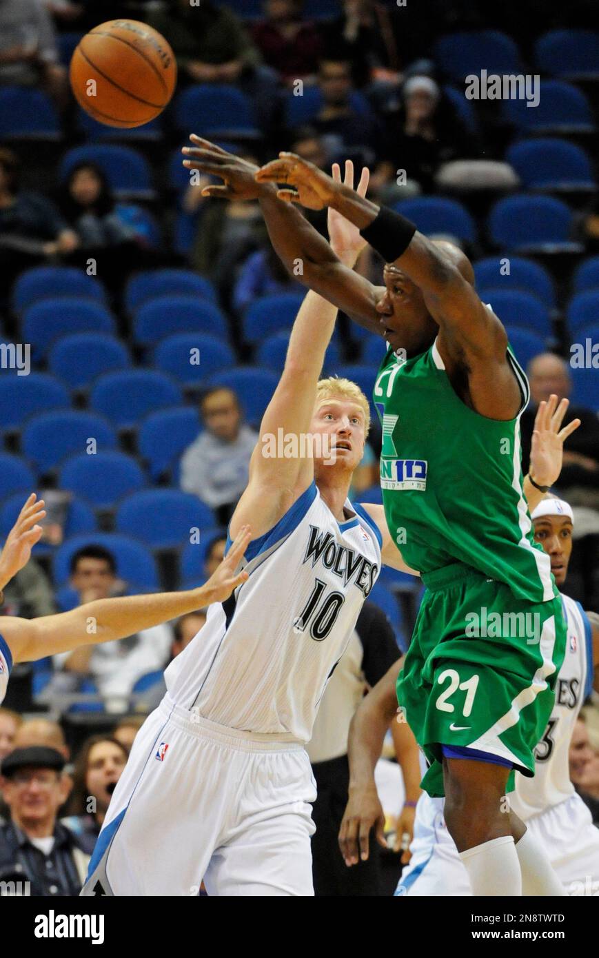 Maccabi Haifa's Cory Carr, right, makes a pass as Minnesota ...