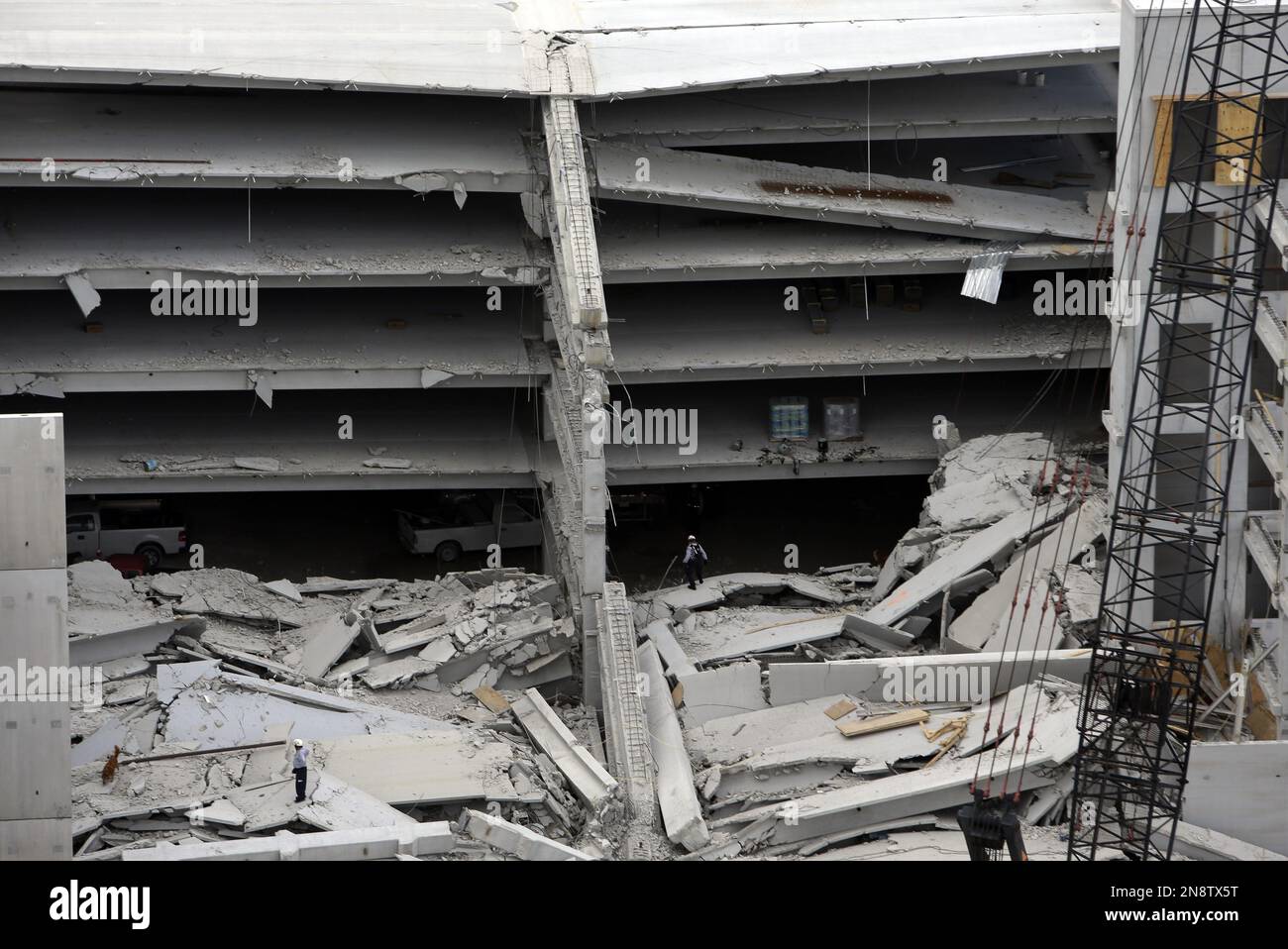 A five-story parking garage is shown after it collapsed at Miami-Dade ...