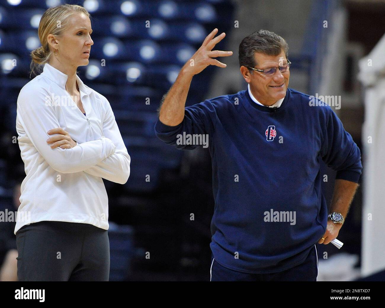Connecticut coach Geno Auriemma, right, gestures as assistant coach ...