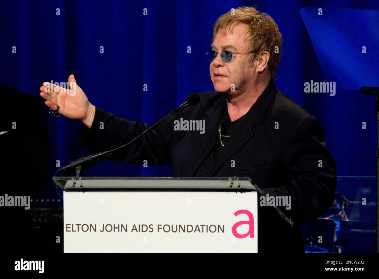 Elton John appears on stage at Elton John's AIDS Foundation's 11th ...