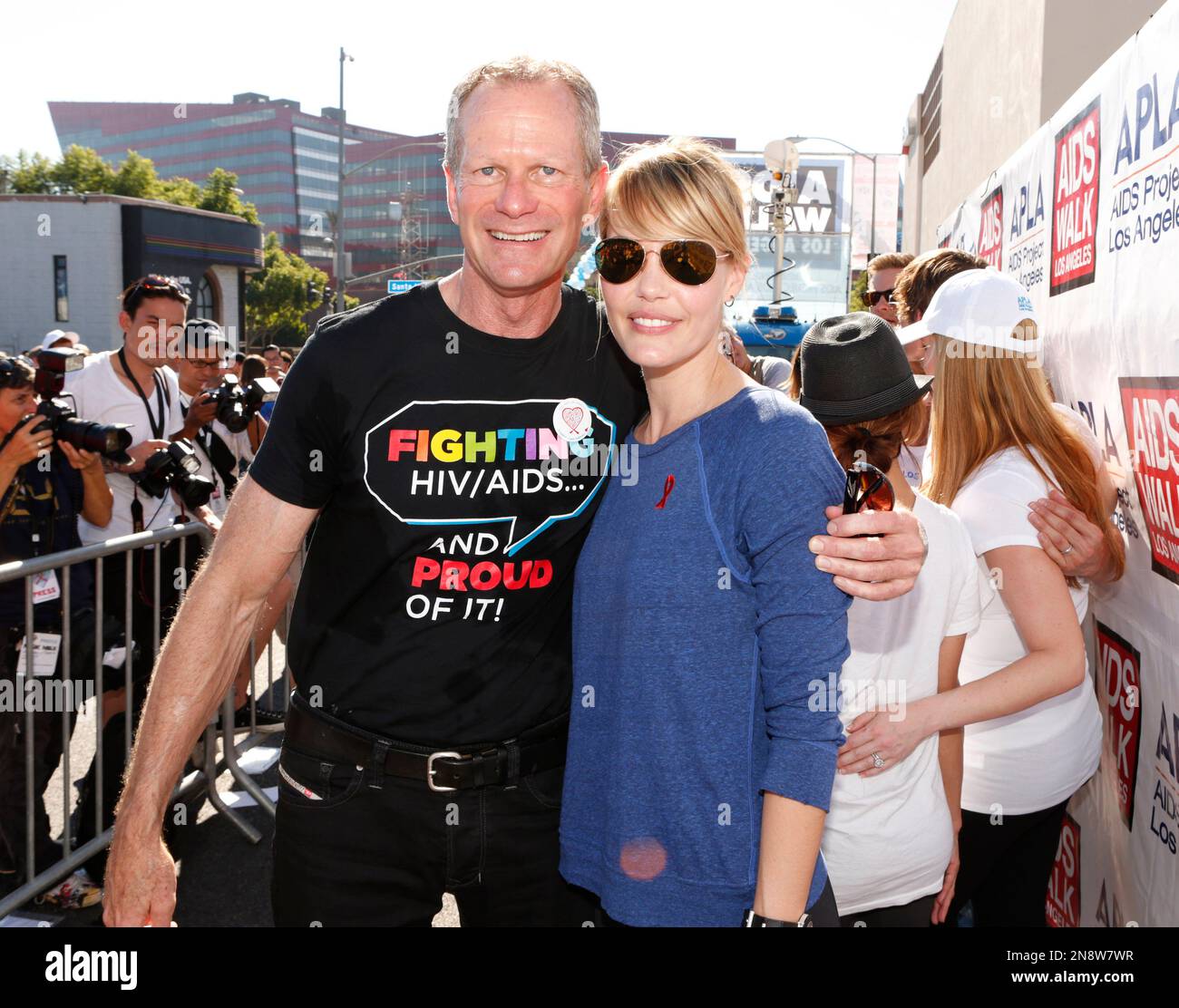 Executive Director APLA Craig Thompson and Leslie Bibb participatesin ...