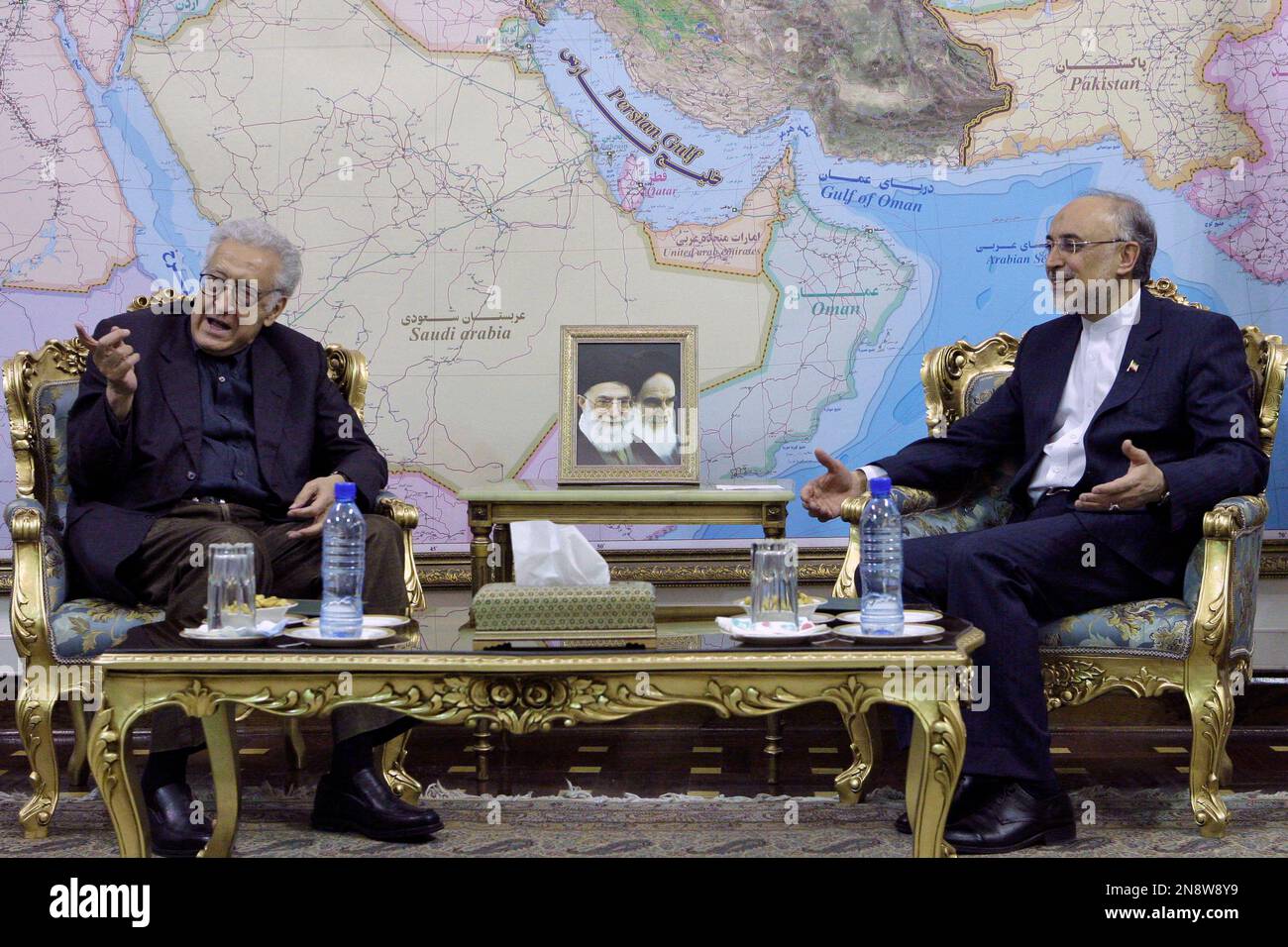 U.N. envoy on Syria, Lakhdar Brahimi, left, talks with Iranian Foreign ...