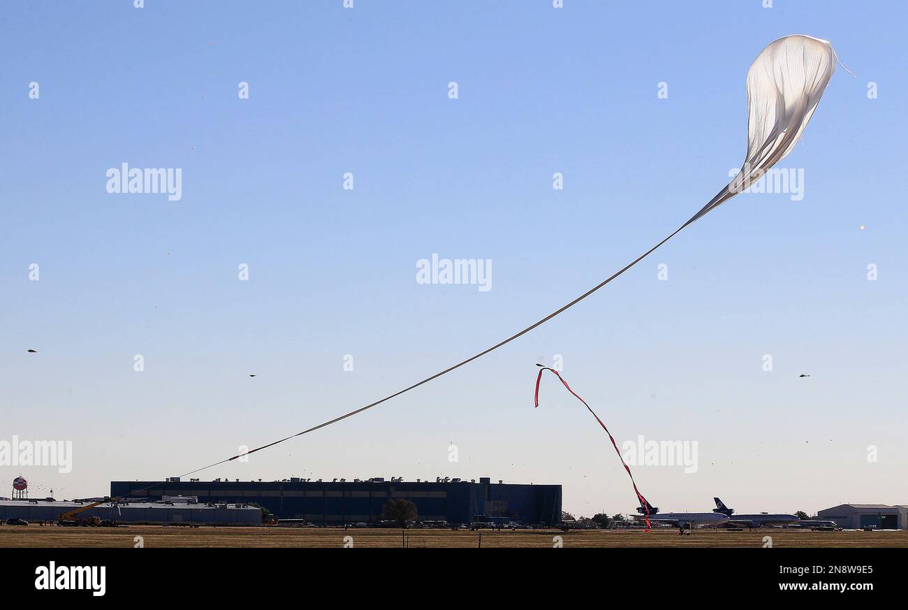 The capsule and attached helium balloon carrying Felix Baumgartner ...