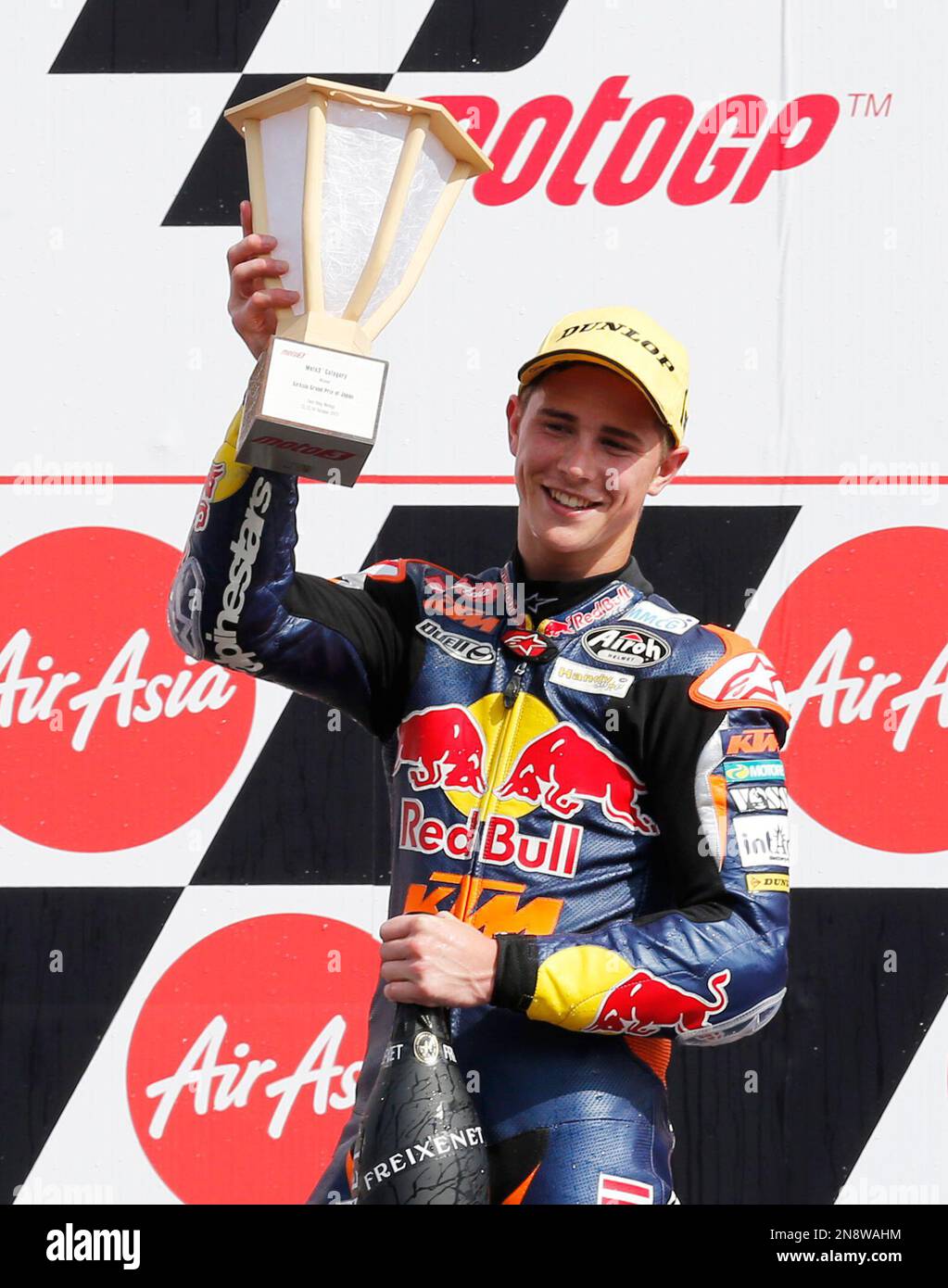 Britain's Danny Kent celebrates on the podium after winning the Moto3 ...