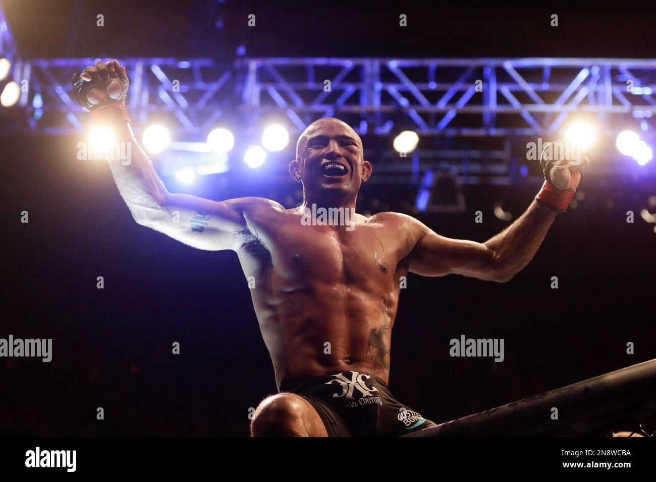 Sergio Moraes, from Brazil, celebrates after defeating countryman Renee ...