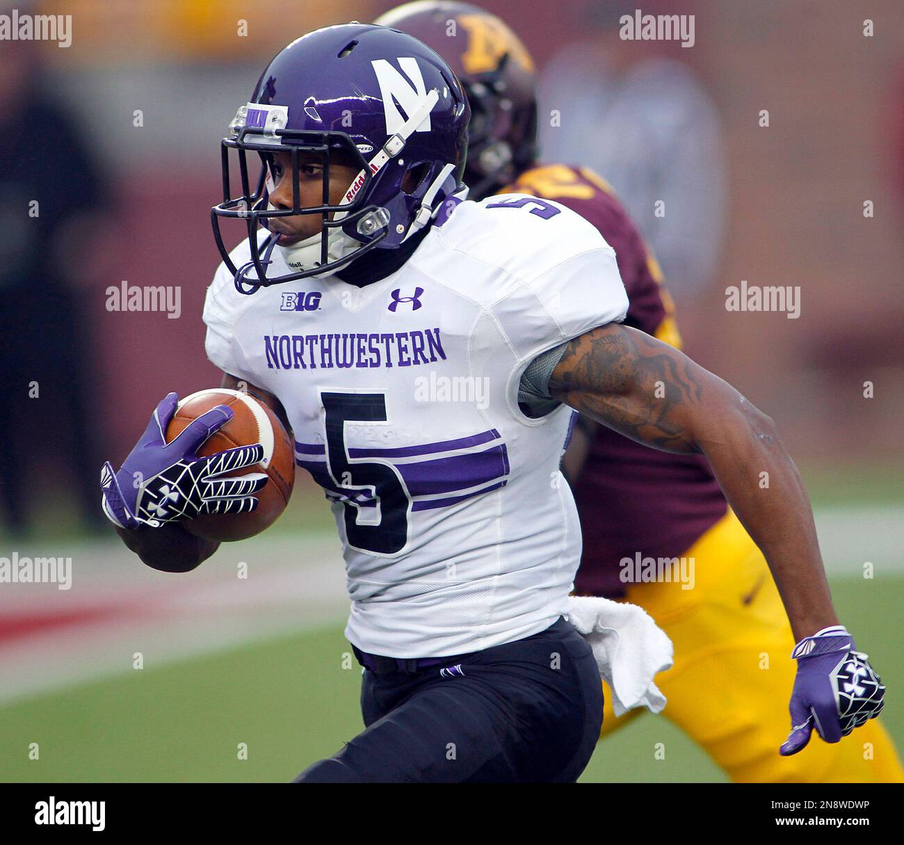 Northwestern running back Venric Mark runs for a touchdown on the first ...