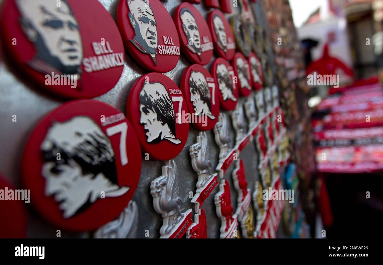 Souvenirs including badges of former managers Bill Shankly and Kenny ...