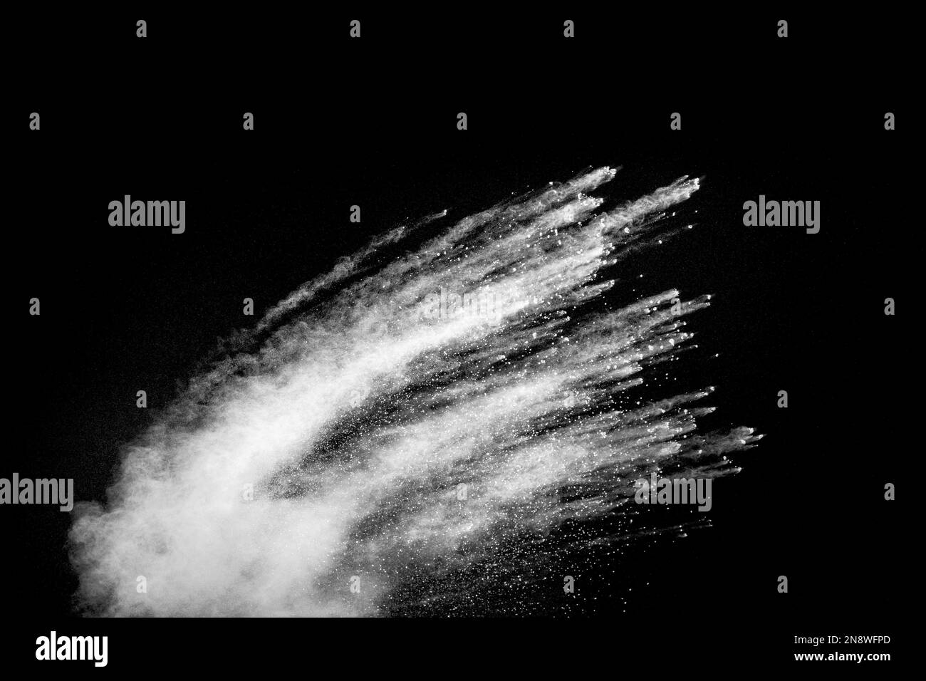 White powder explosion clouds.Freeze motion of white dust particles ...
