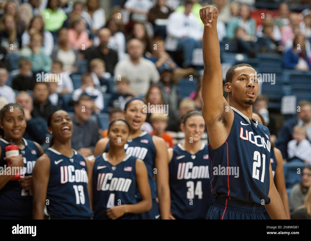 Connecticut's Omar Calhoun (21) follows through on a throw during a ...