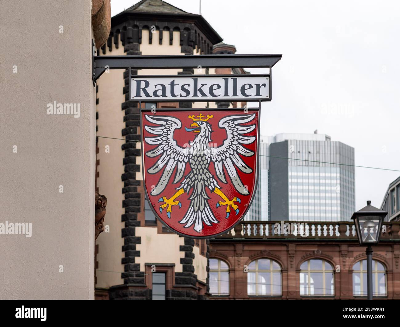 Ratskeller sign next to the town hall building. A historical restaurant ...