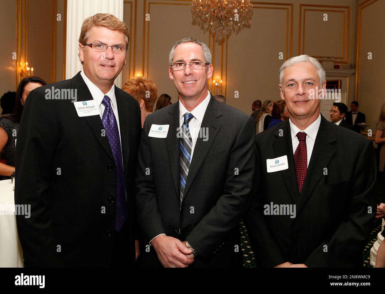 Jamie Wilson, Tom Sellers and Mark Smith are seen at Moffitt Cancer ...