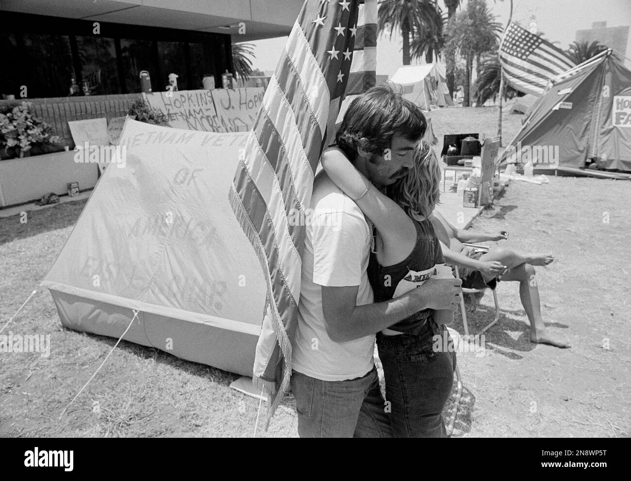 Hunger striker Steve Androff gets a supportive hug from Teri Reagan as ...