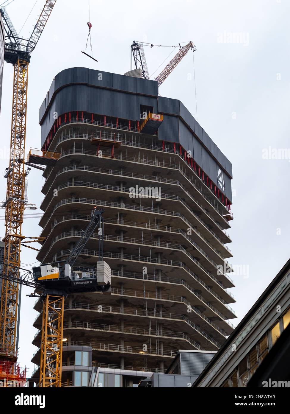 FOUR Frankfurt construction site with tower cranes. Big commercial ...