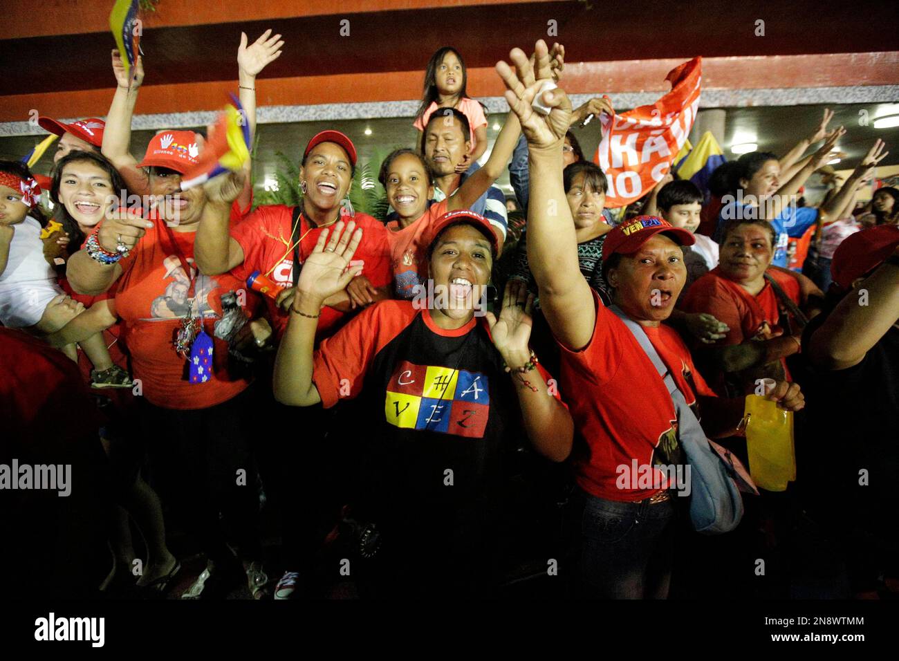 Supporters of Venezuela's President Hugo Chavez cheer during a ceremony ...