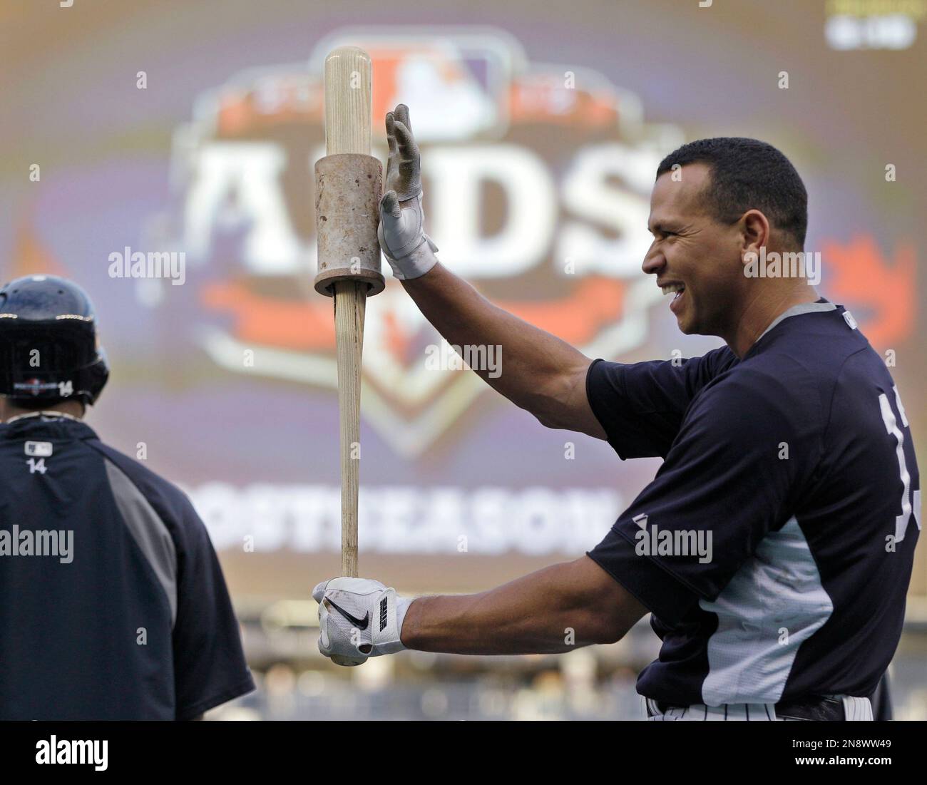 New York Yankees' Alex Rodriguez slaps his bat with his hand during ...