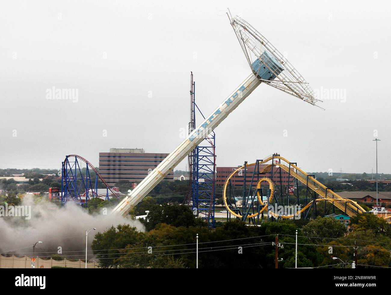 The Texas Chute Out ride falls over as planned during an implosion by ...