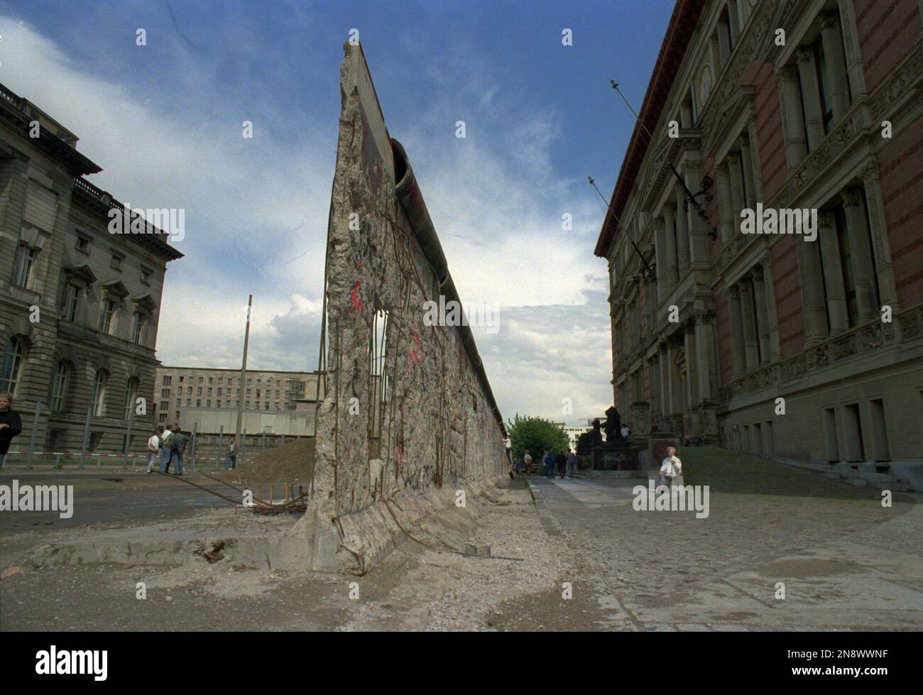 A broken remnant of the Berlin Wall, with steel reinforcing rods ...