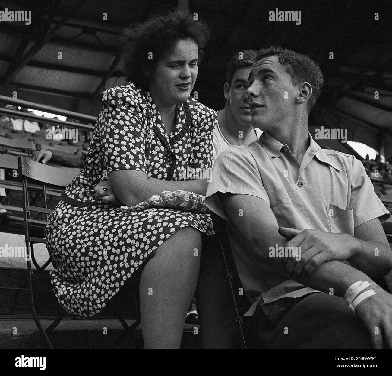 Charles Comiskey talking to his sister, Grace Lou, next older of the ...