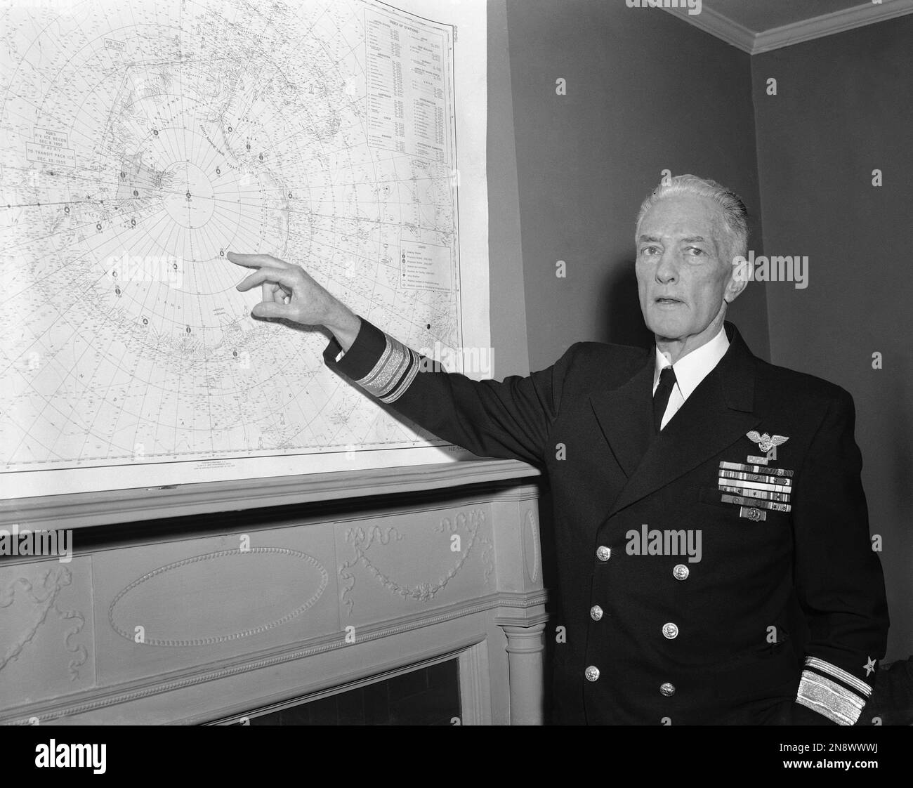 Rear Admiral Richard E. Byrd uses a map in Washington on Nov. 24, 1955 ...