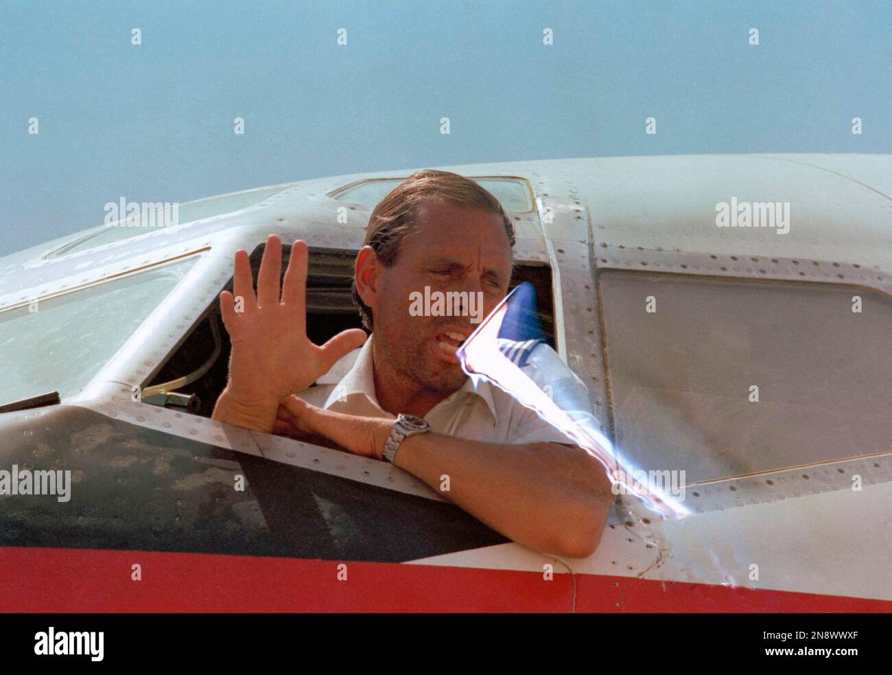 Captain of hijacked TWA jet John L. Testrake talks to reporters from ...