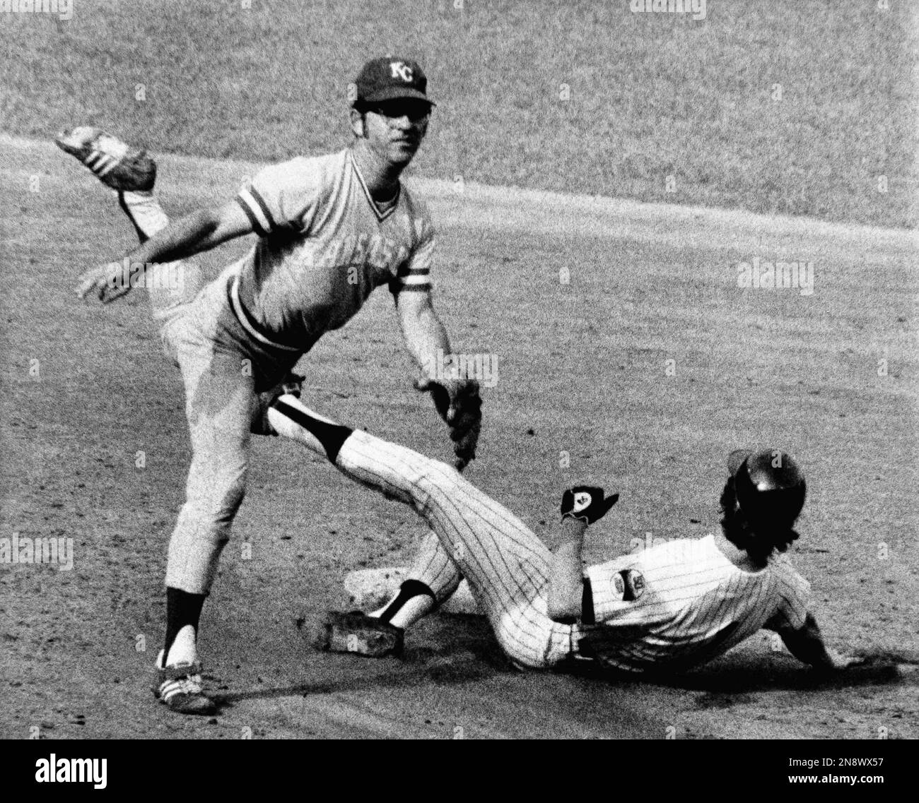 New York Yankees' Bobby Murcer, right, continues his slide to second ...
