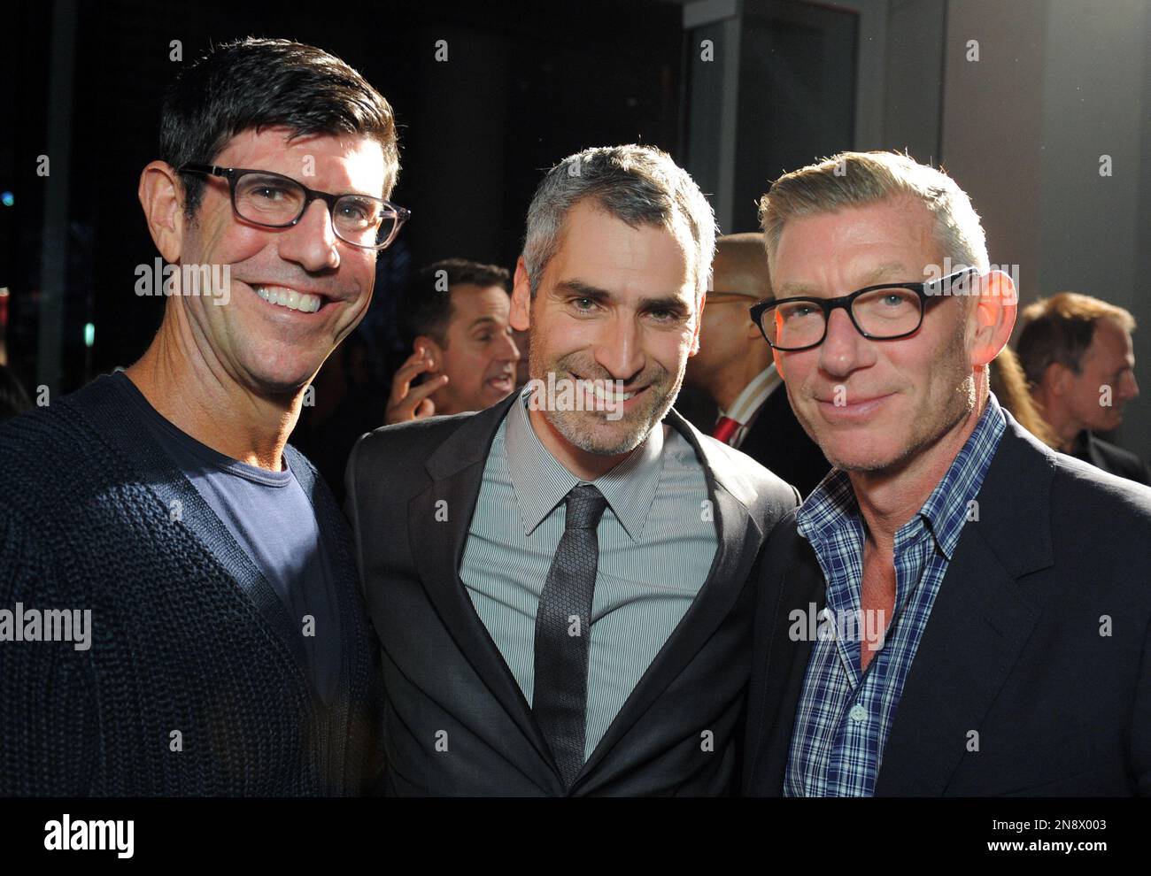 Rich Ross, left, OUT Magazine Editor in Chief Aaron Hicklin, center ...