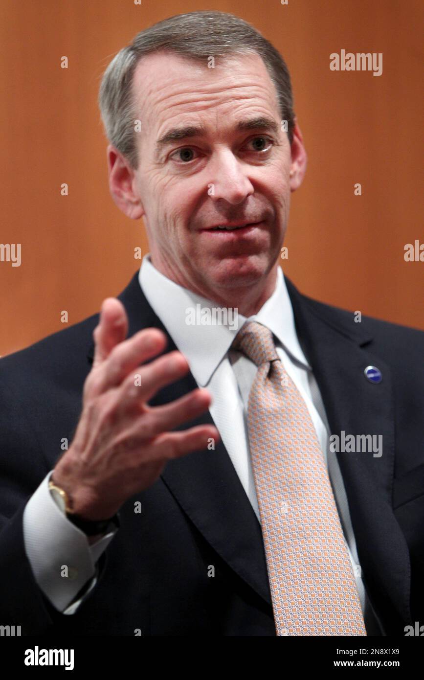 American Airlines CEO Tom Horton talks to a reporter in New York ...