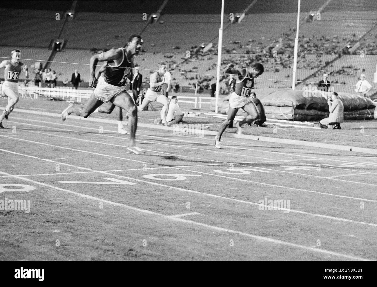 John Carlos, center, of San Jose State University, leads an American ...