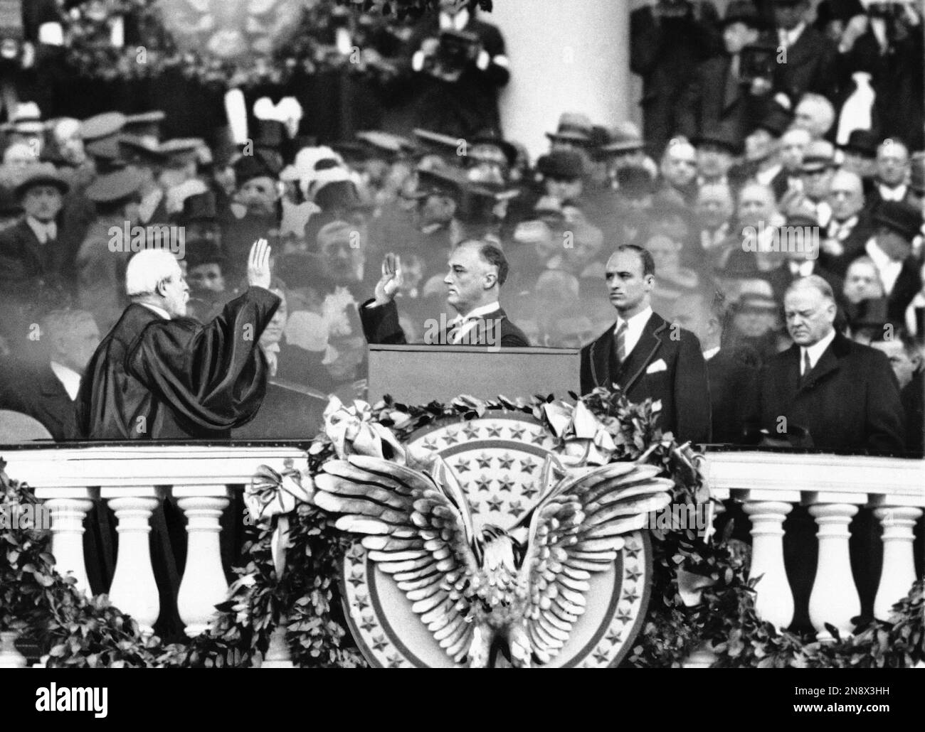President Franklin D. Roosevelt takes the oath of office from Chief ...