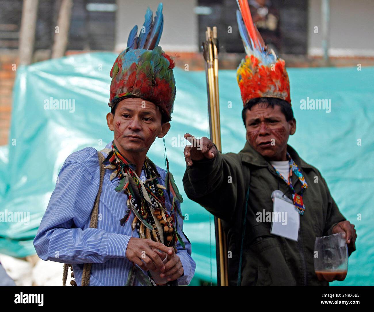 Men from the Curripaco Indian tribe arrive for the inauguration of the ...