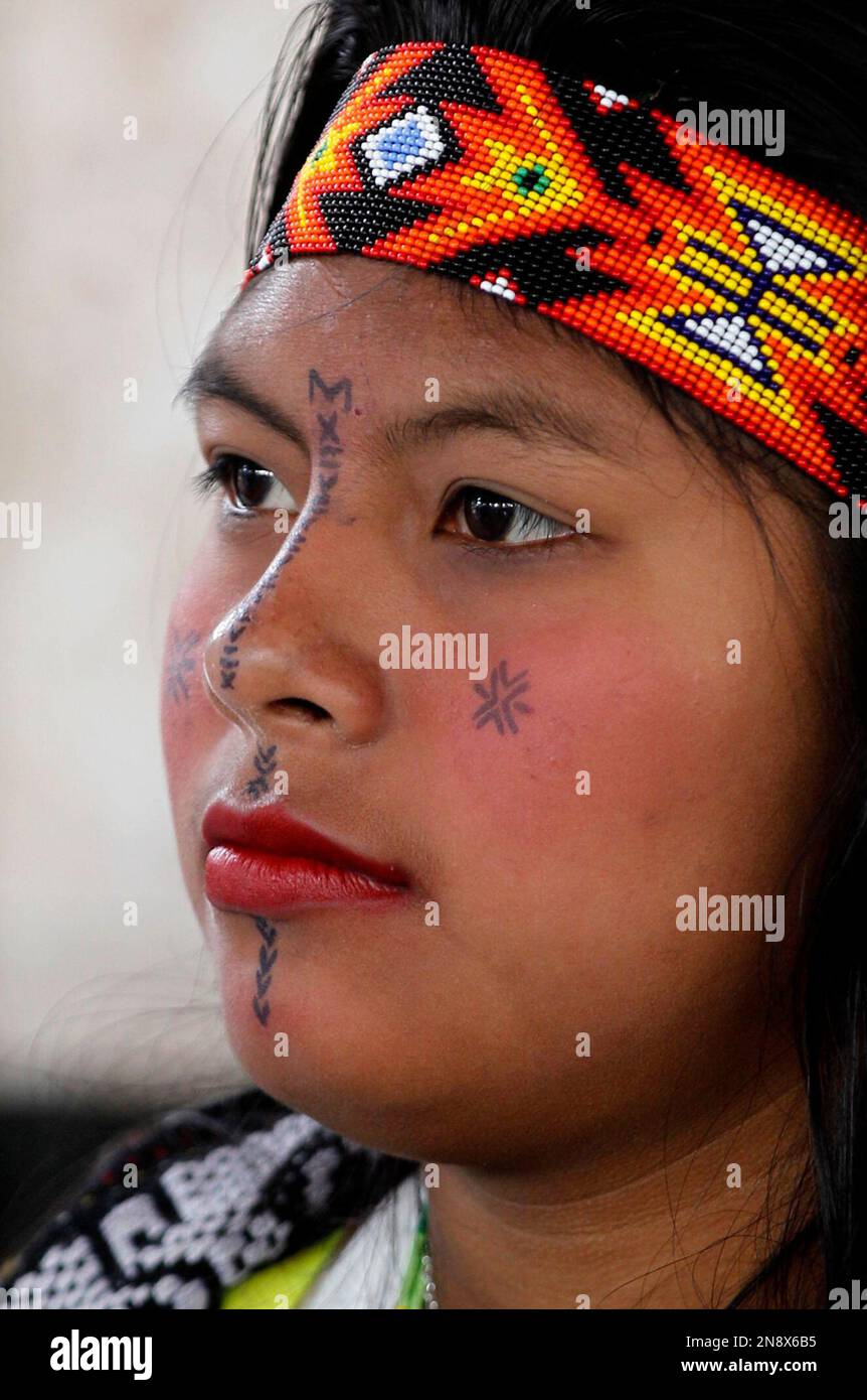 A woman of the Embera-Katio tribe attends the VIII Indian National ...