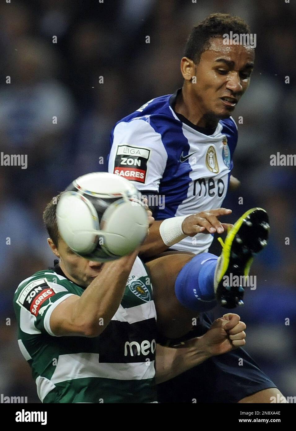 FC Porto's Danilo Silva, right, from Brazil challenges for a high ball ...