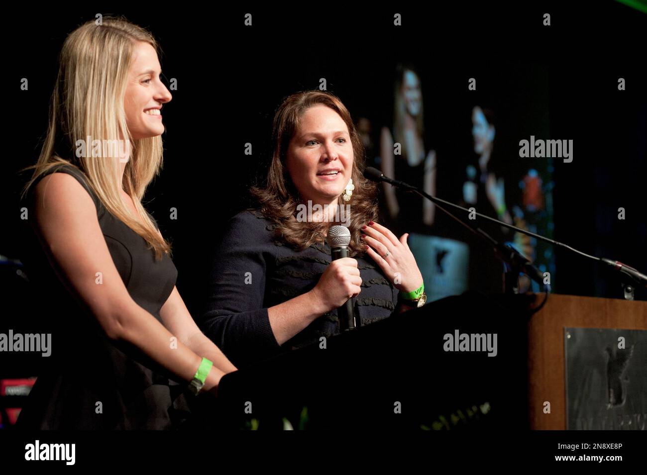 Bethany Becker, left, and Jennifer Buckmaster speak during Eva Longoria ...